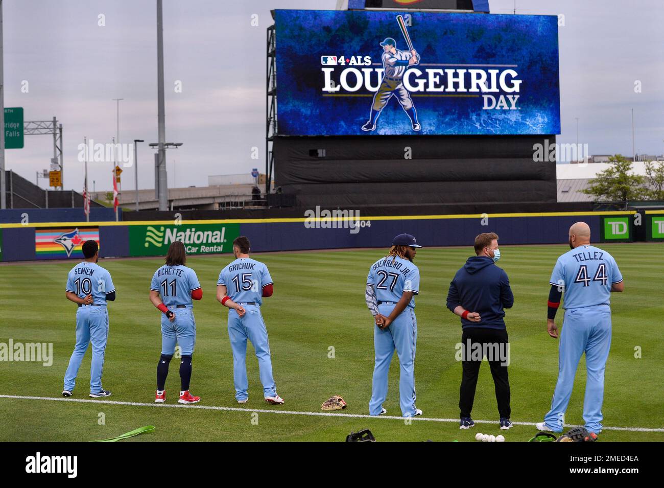 Toronto Blue Jays players stand on the field as Major League Baseball's ...