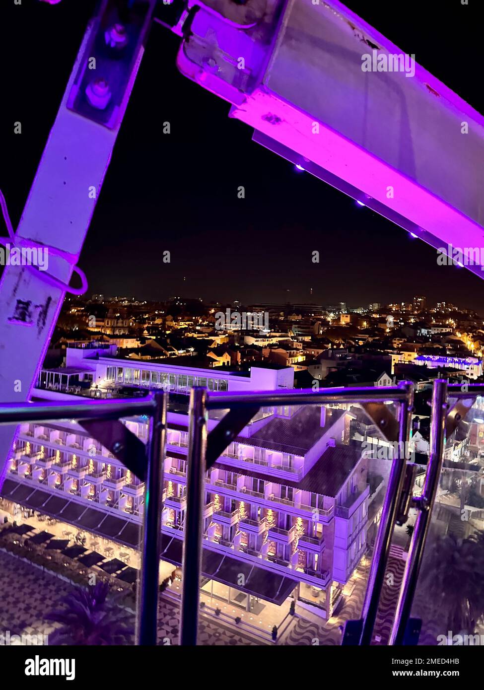 the night time cityscape viewed from a skyscraper balcony Stock Photo ...