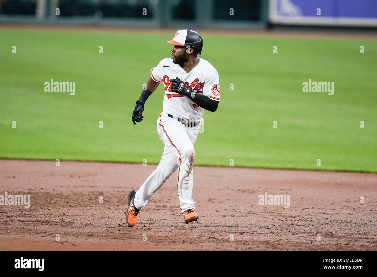 Baltimore Orioles' Cedric Mullins rounds first base after hitting a ...