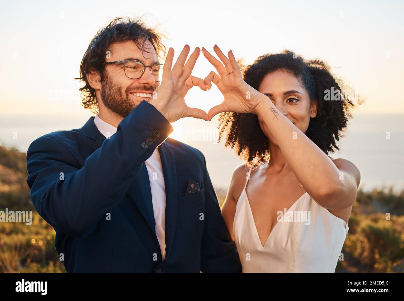 Heart hand sign, marriage and wedding couple in nature at love, trust ...