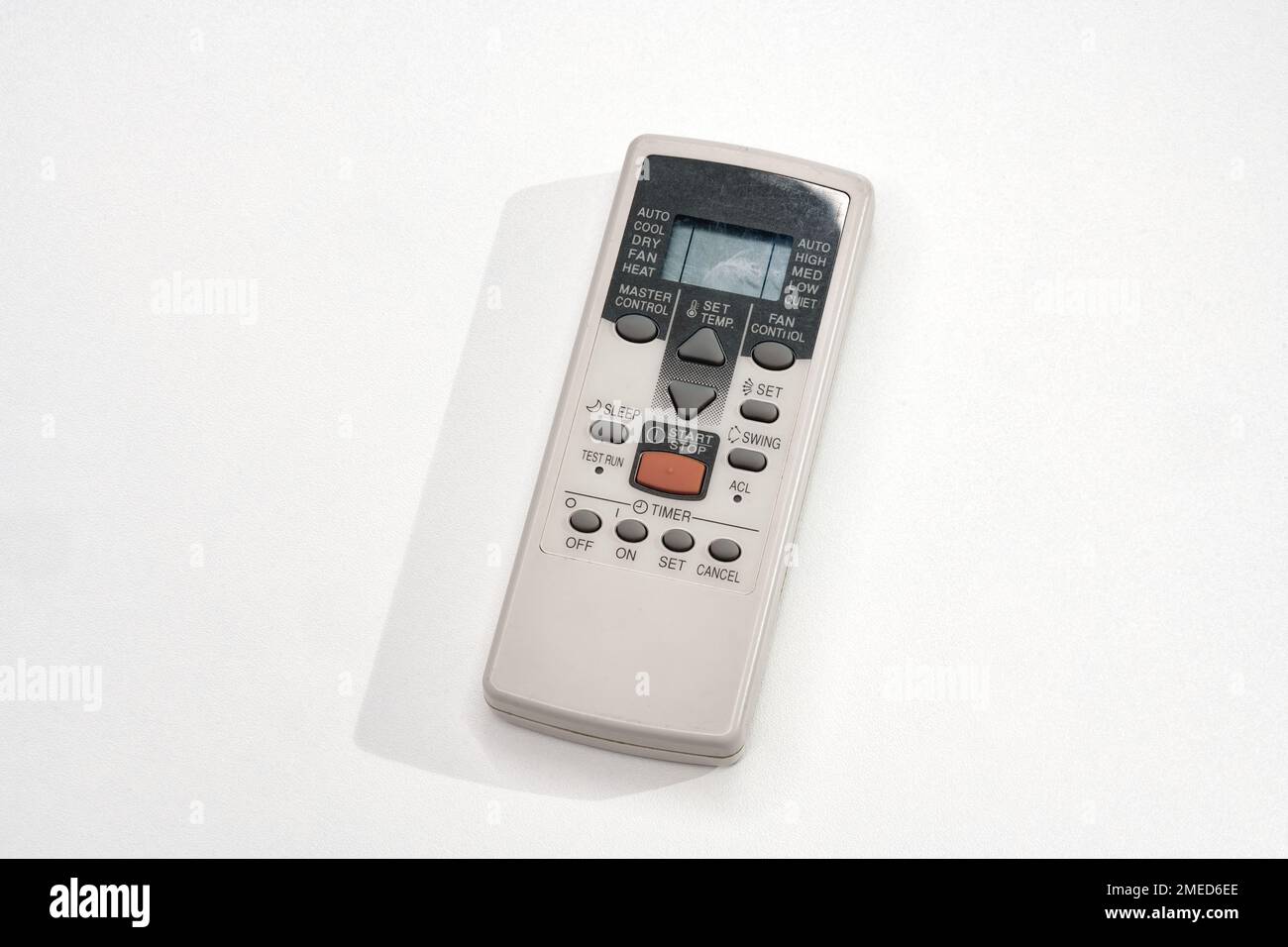 Air conditioner remote control on white background Stock Photo - Alamy