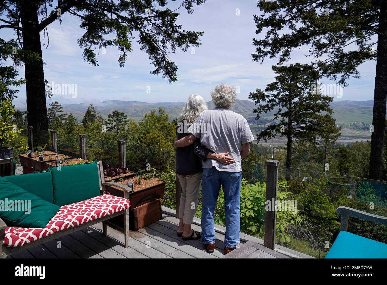 Gordon Bennett and his wife Kate Carolan stand on the deck outside ...