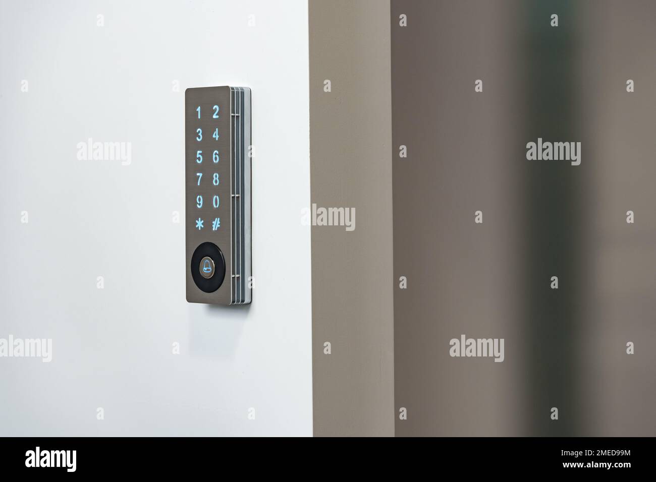Electronic digital door lock on white office wall Stock Photo - Alamy