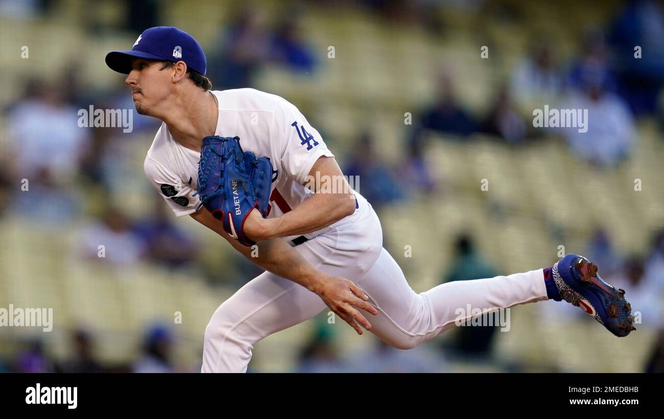 Los Angeles Dodgers starting pitcher Walker Buehler throws during a ...