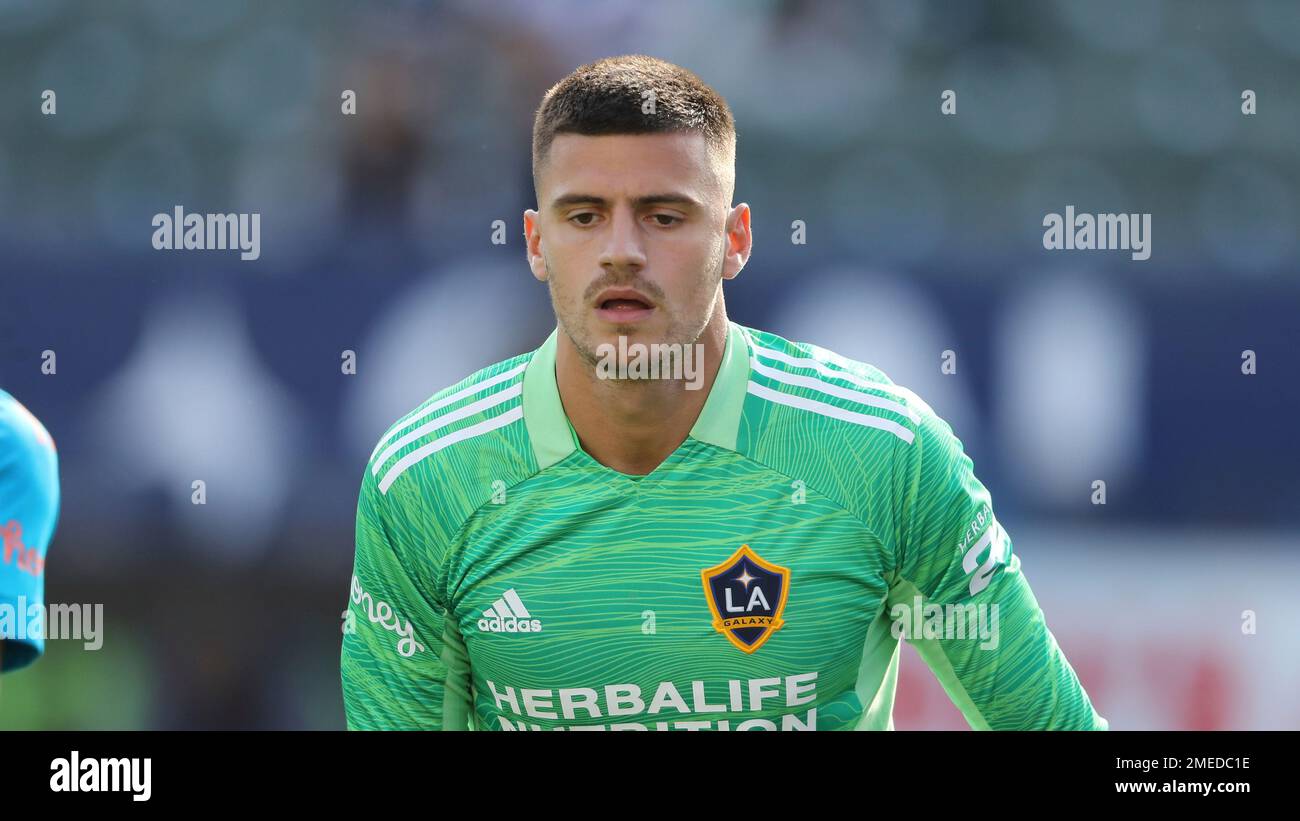 Los Angeles Galaxy goalkeeper Jonathan Bond (1) goes to pick up the ...