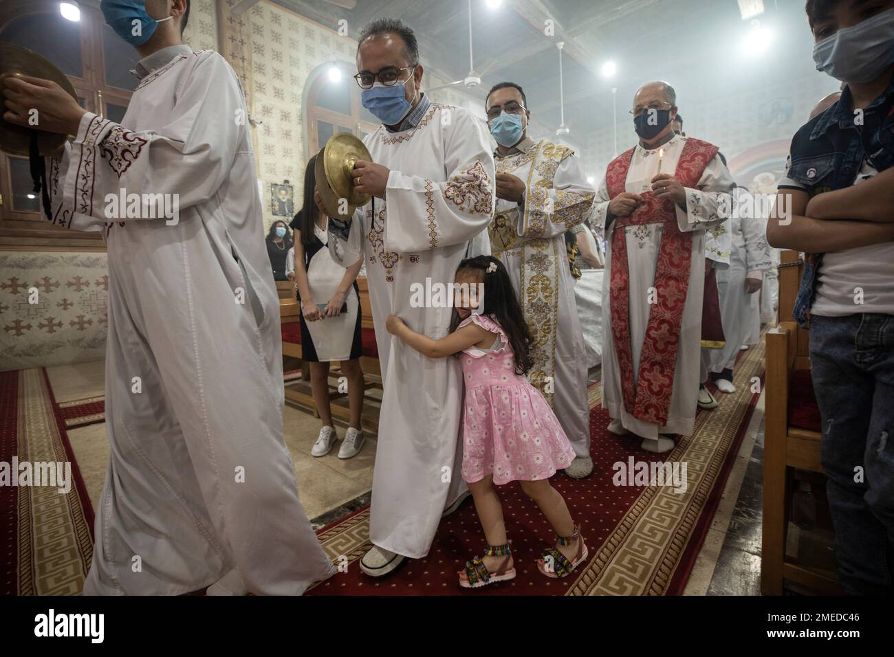 Coptic Orthodox deacon pray during Easter mass, at Holy Cross Church in ...