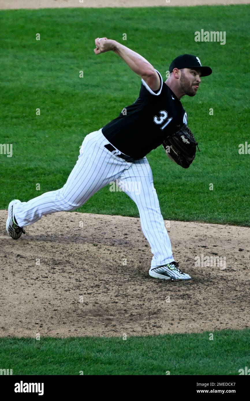 Chicago White Sox relief pitcher Liam Hendriks (31) delivers during the ...