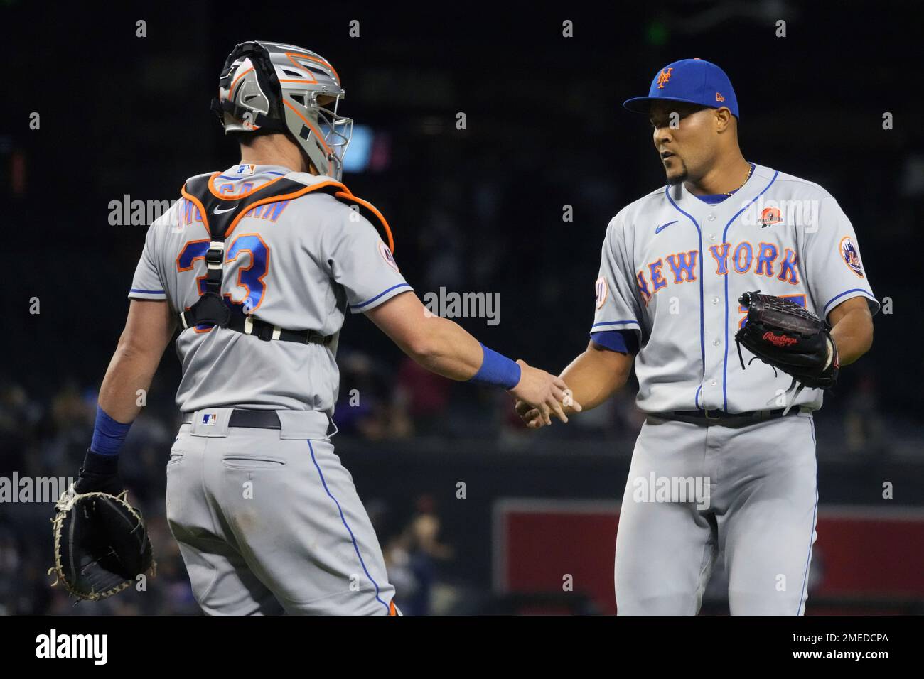 New York Mets catcher James McCann (33) and pitcher Jeurys Familia ...