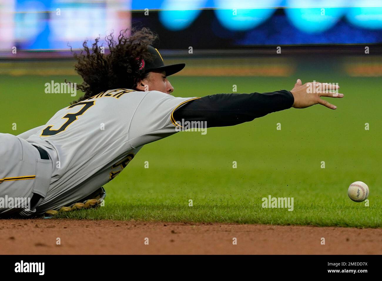 Pittsburgh Pirates shortstop Cole Tucker can't field a single by Kansas ...