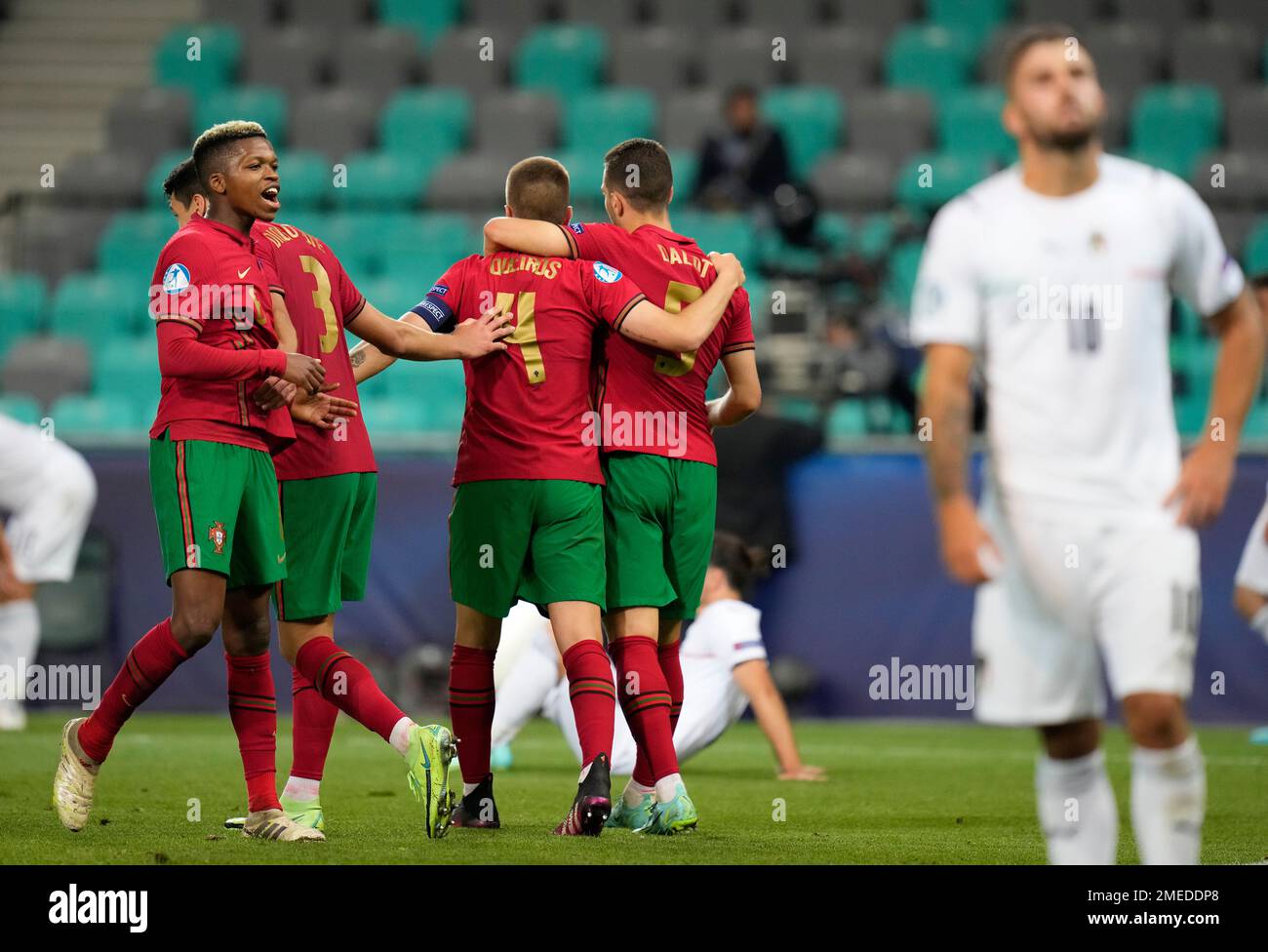 Portuguese players celebrate at the end of the Euro U21 quarterfinal ...