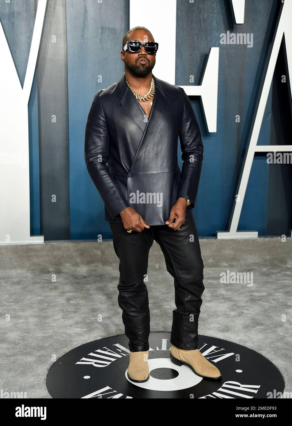 FILE - Kanye West arrives at the Vanity Fair Oscar Party on Feb. 9 ...
