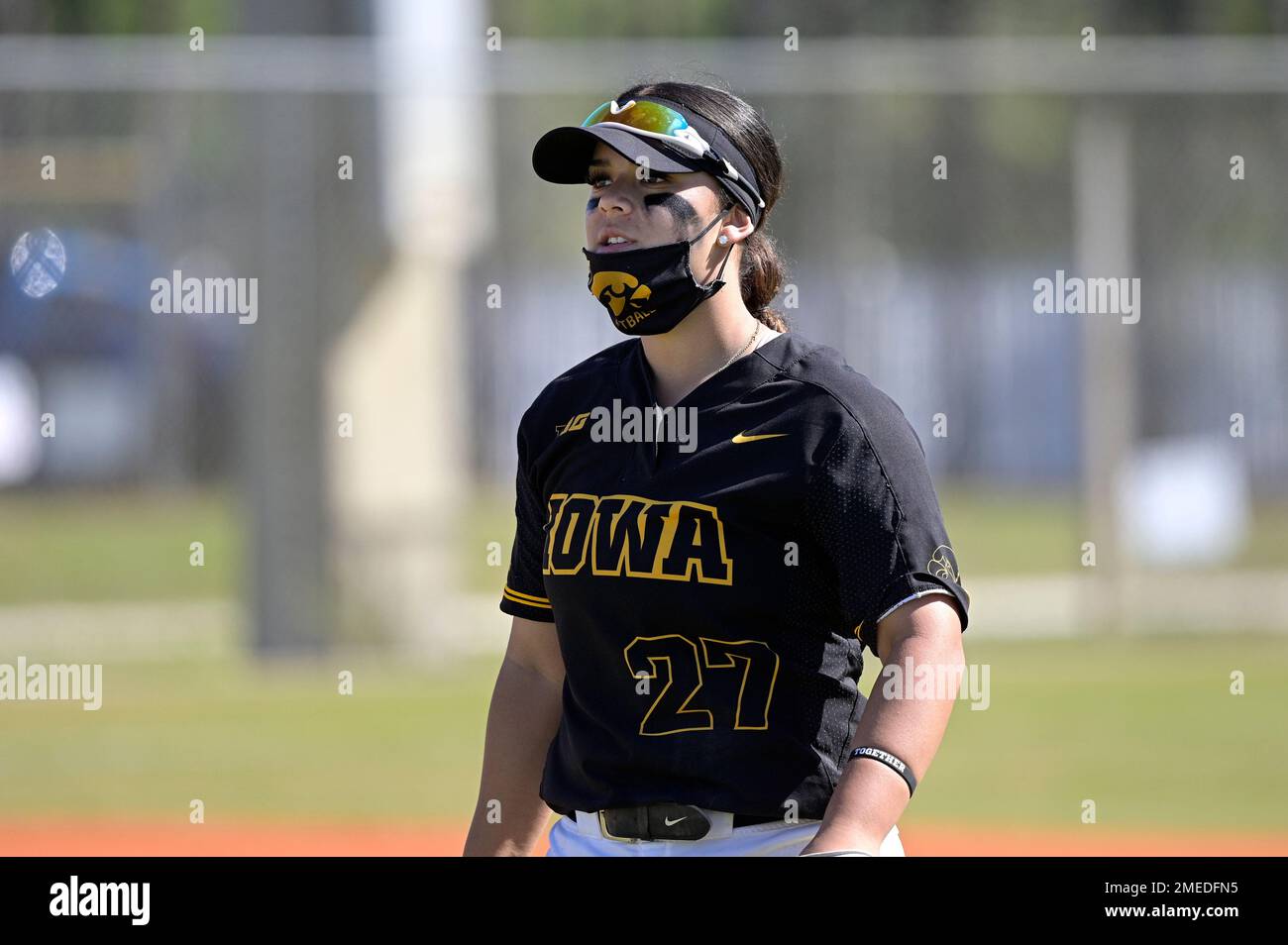 Iowa utility Amber DeSena (27) stands on the field during an NCAA ...