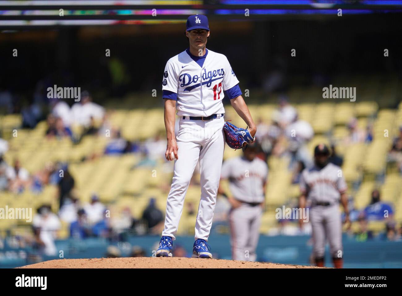 Los Angeles Dodgers relief pitcher Joe Kelly (17) stands on the mound ...