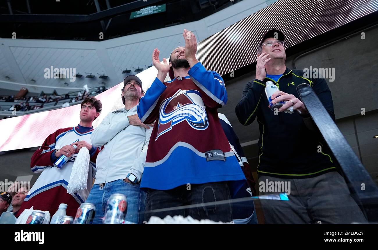 Colorado Avalanche fans cheer in the third period of Game 1 of an NHL ...