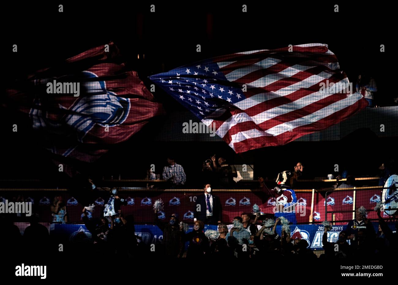 Colorado Avalanche mascot Bernie waves a flag before an NHL hockey ...