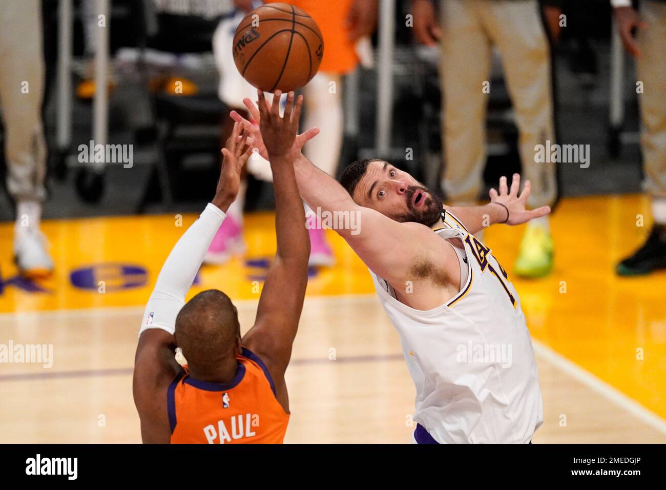 Phoenix Suns guard Chris Paul, left, shoots as Los Angeles Lakers ...
