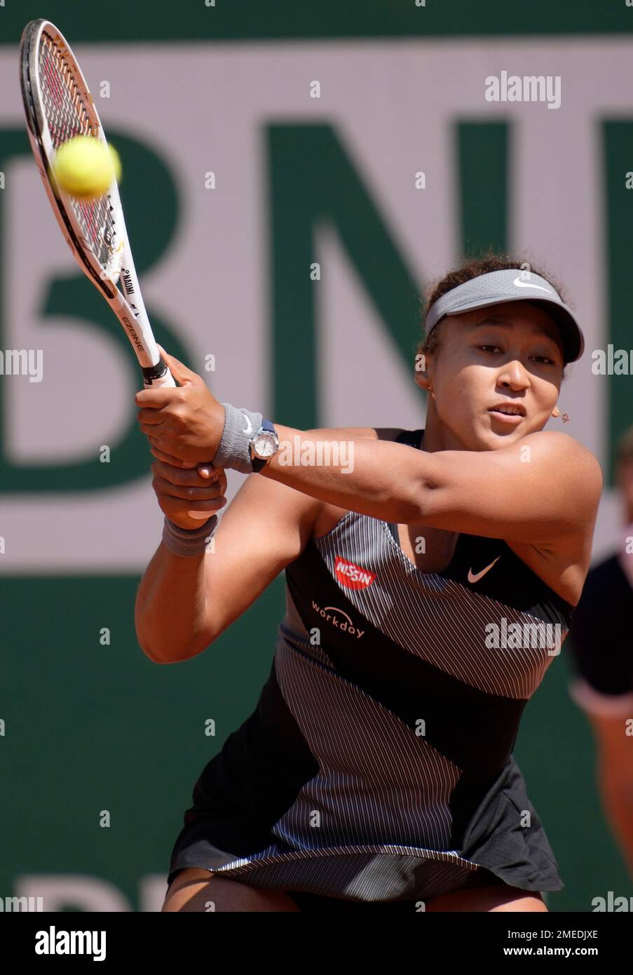 Japan's Naomi Osaka returns the ball to Romania's Patricia Maria Tig ...