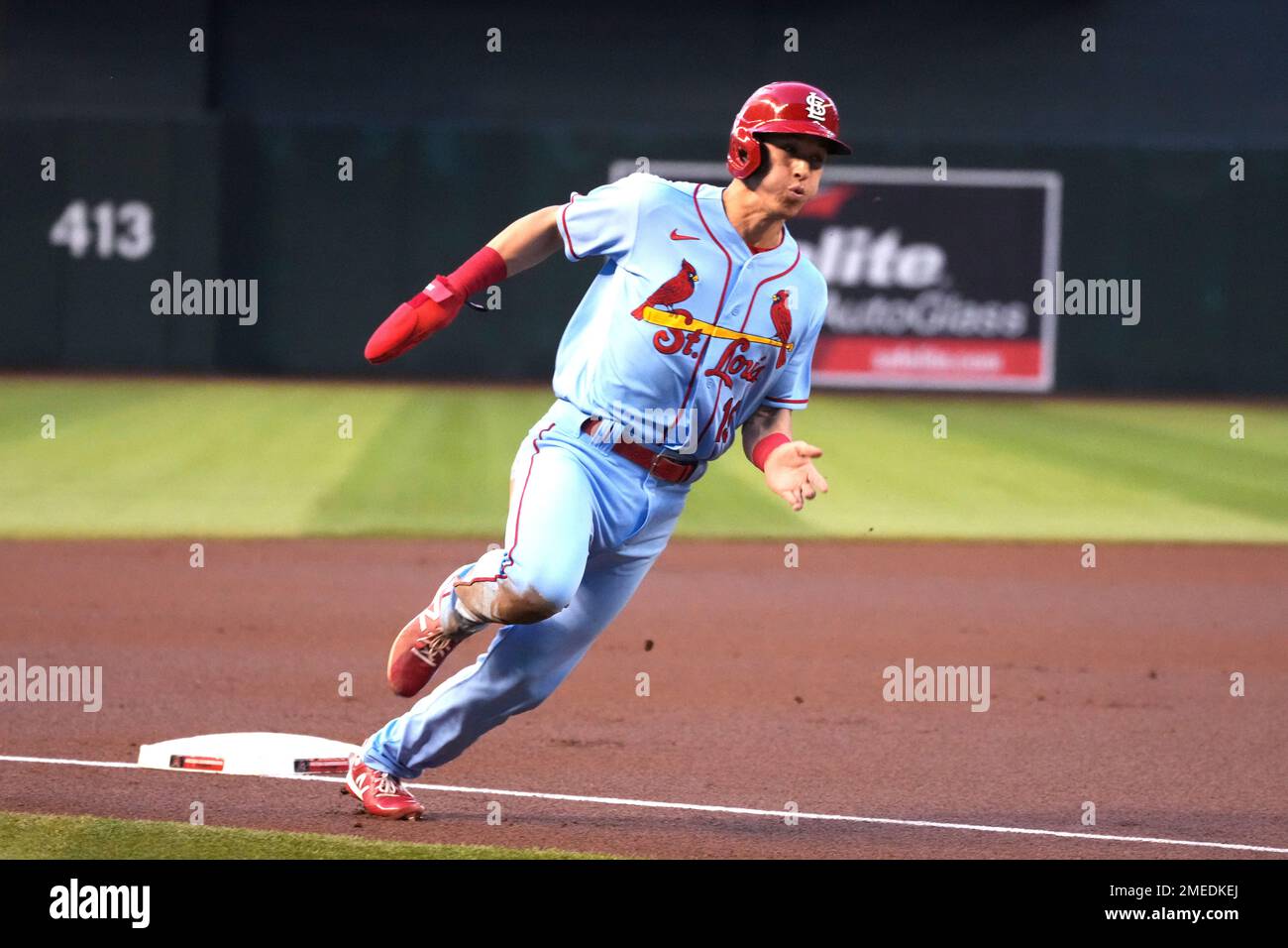 St. Louis Cardinals' Tommy Edman rounds third on the way to scoring ...