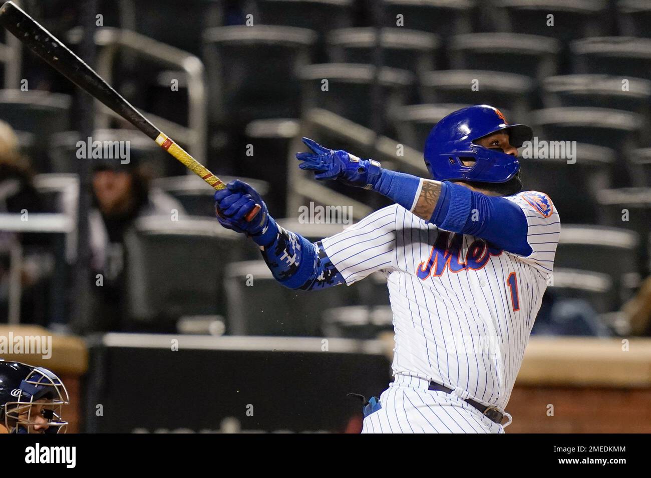 New York Mets' Jonathan Villar (1) follows through on a home run during ...
