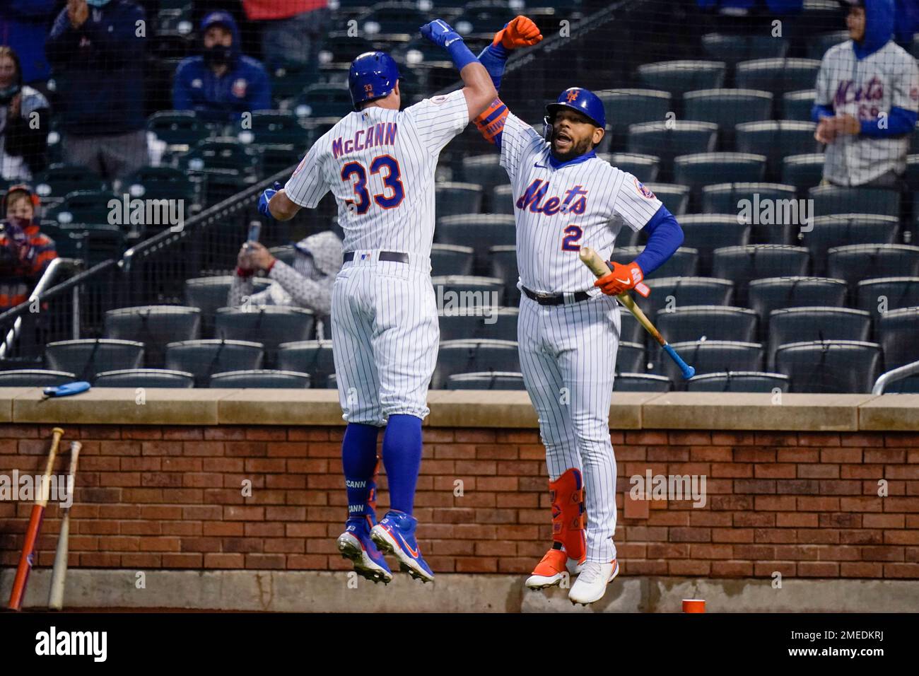 New York Mets' James McCann (33) celebrates with Dominic Smith (2 ...