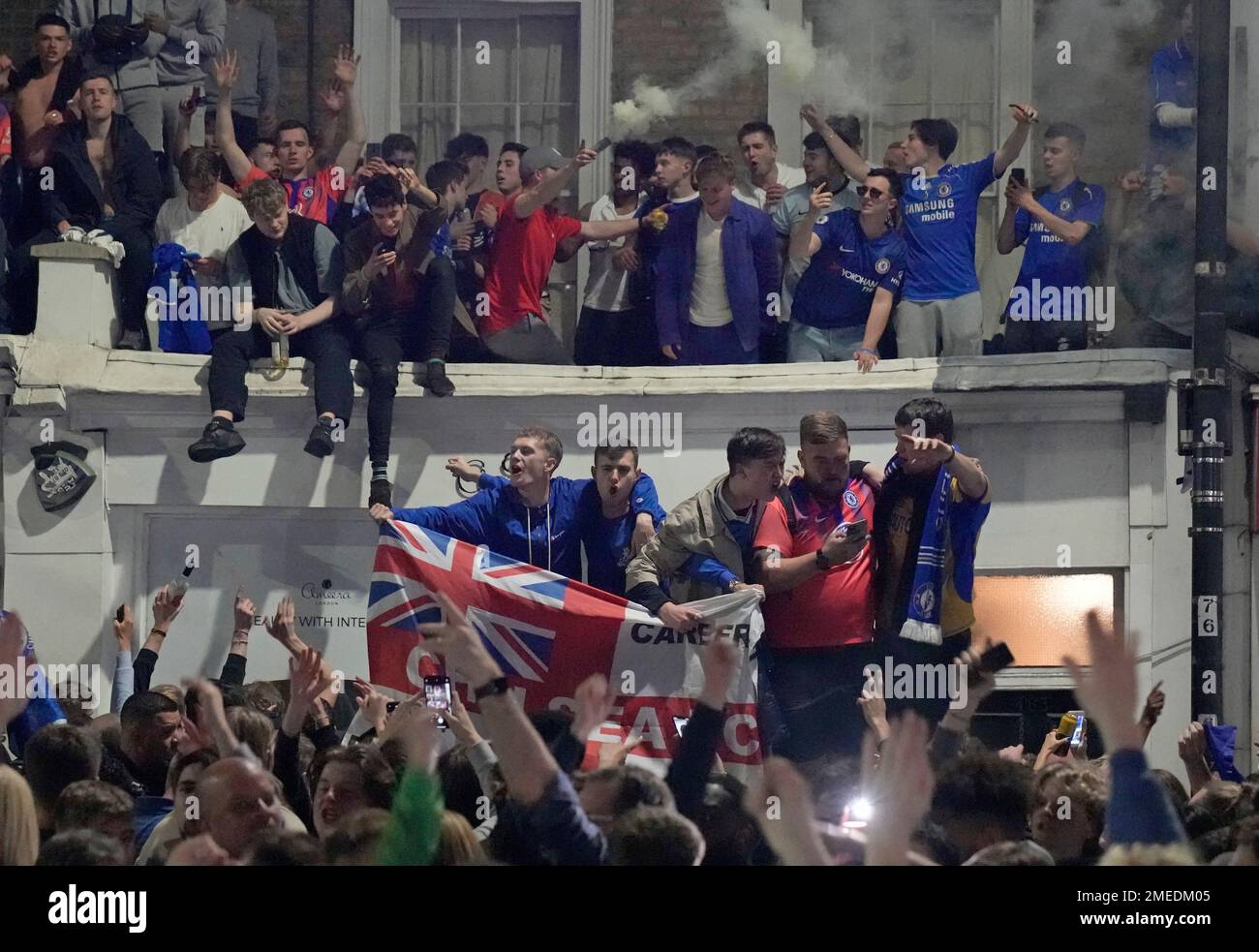 Chelsea supporters celebrate in west London, England after their team ...