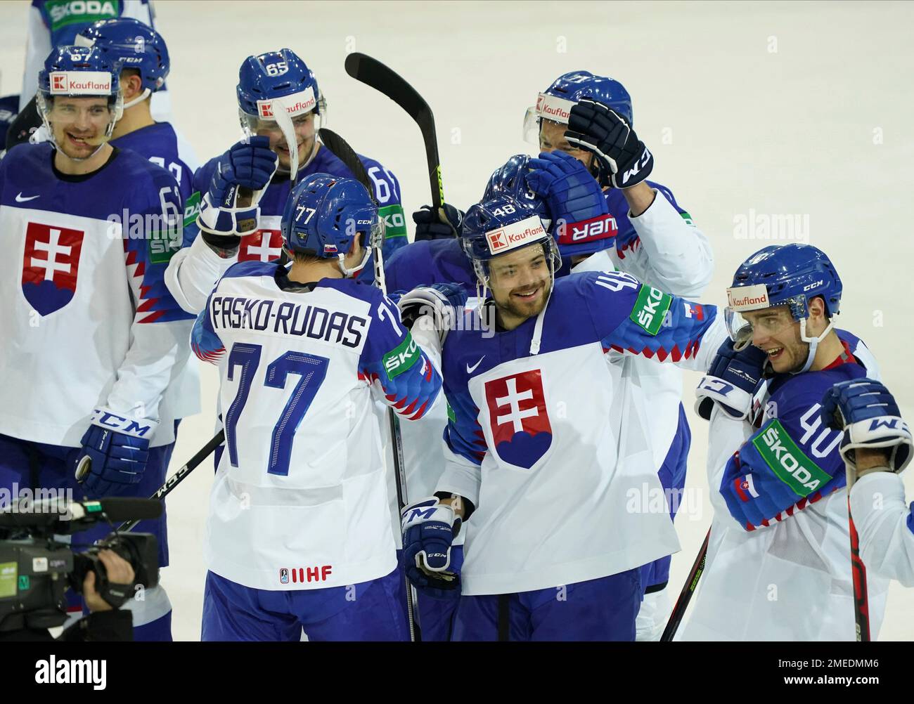 Slovakia team players celebrate their victory during the Ice Hockey ...
