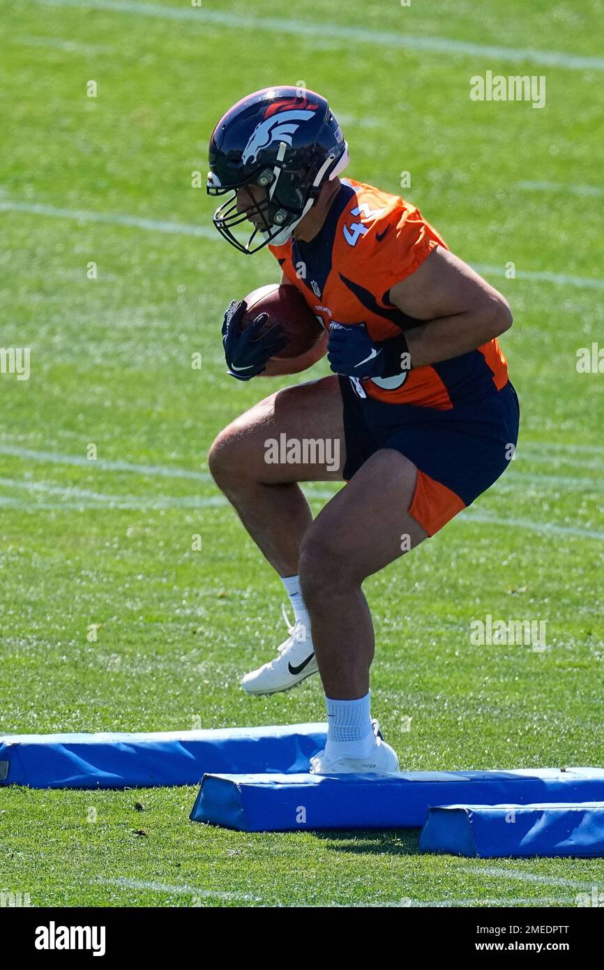 Denver Broncos running back Adam Prentice (43) runs a drill during an ...
