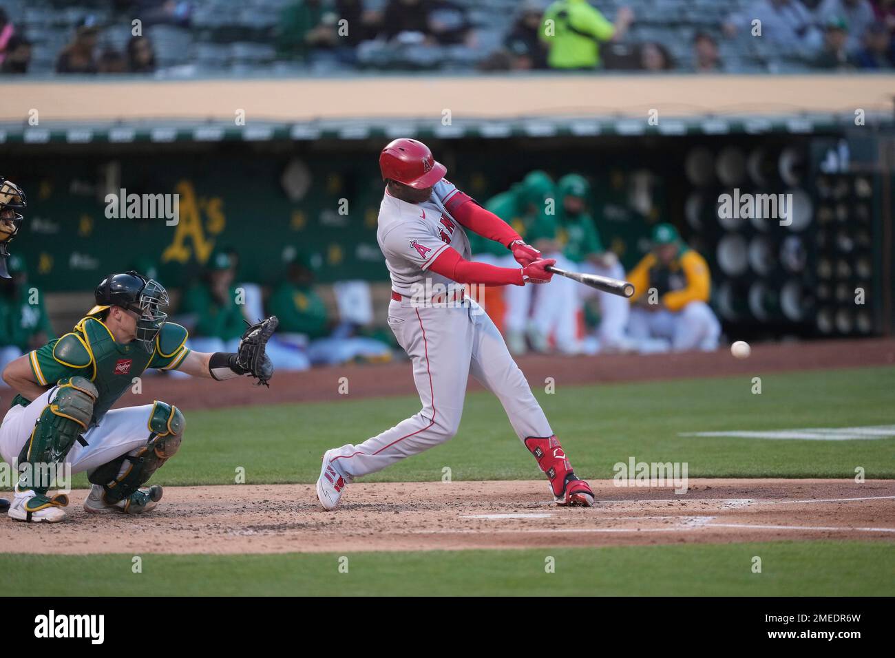 Los Angeles Angels' Justin Upton (10) hits a single against the Oakland ...