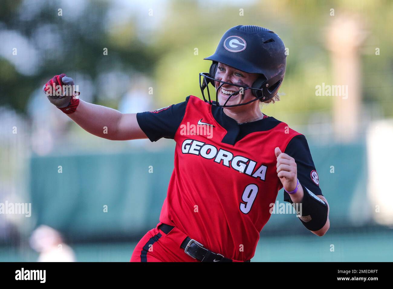Georgia outfielder Sydney Chambley (9) rounds third, hit in by Payden ...