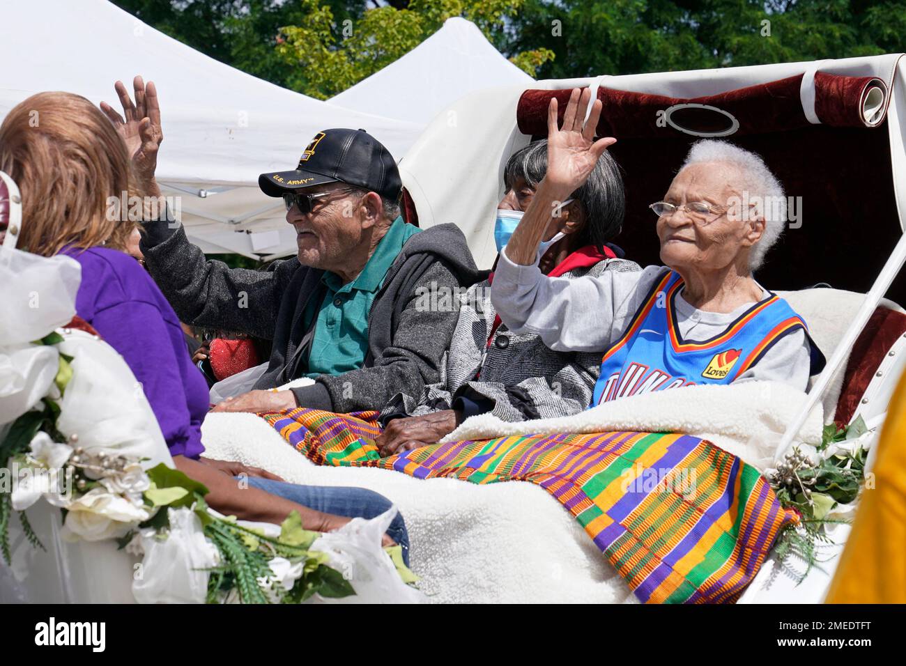 Tulsa race massacre survivors Hughes Van Ellis Sr., left, Lessie ...