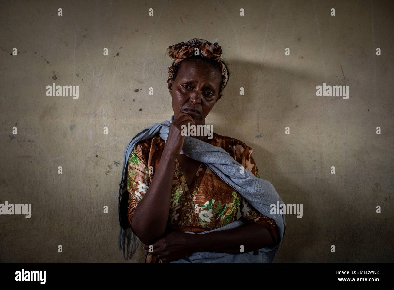Tirhas Gebre, 45, a mother of eight, is photographed after describing ...