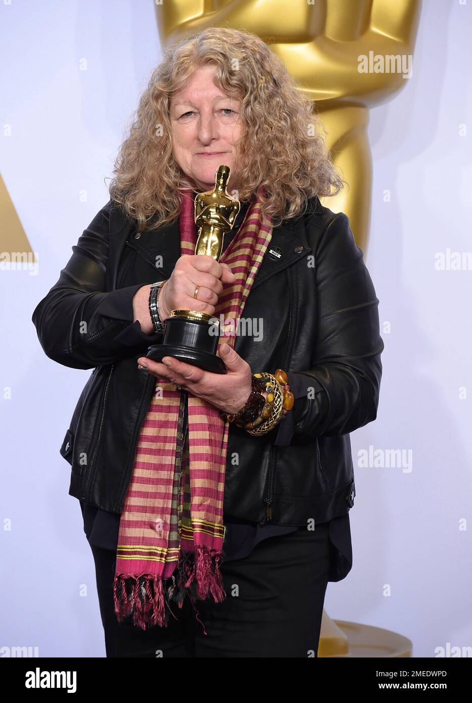 FILE - Jenny Beavan poses with the award for best costume design for ...
