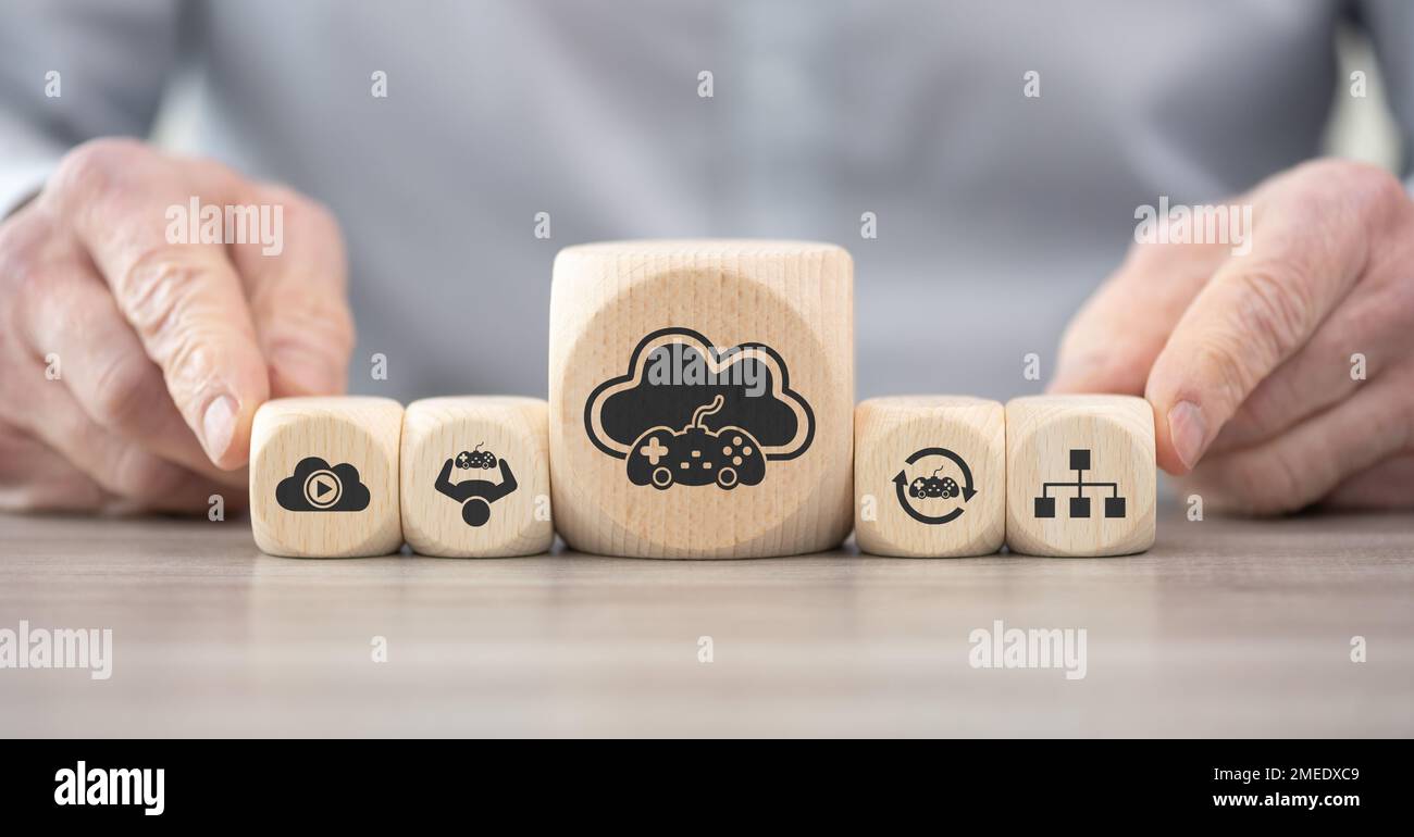 Wooden blocks with symbol of cloud gaming concept Stock Photo - Alamy