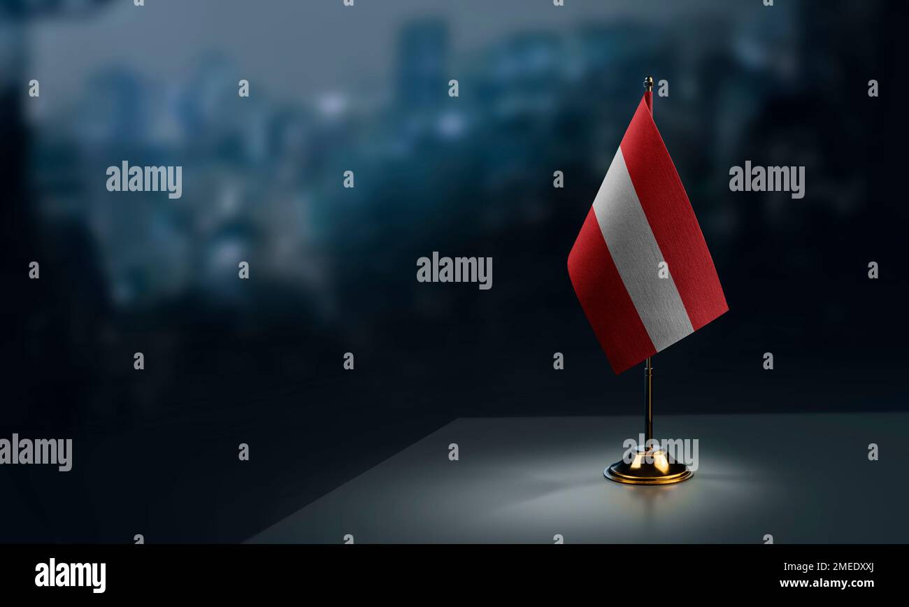 Small flags of the Austria on an abstract blurry background Stock Photo ...