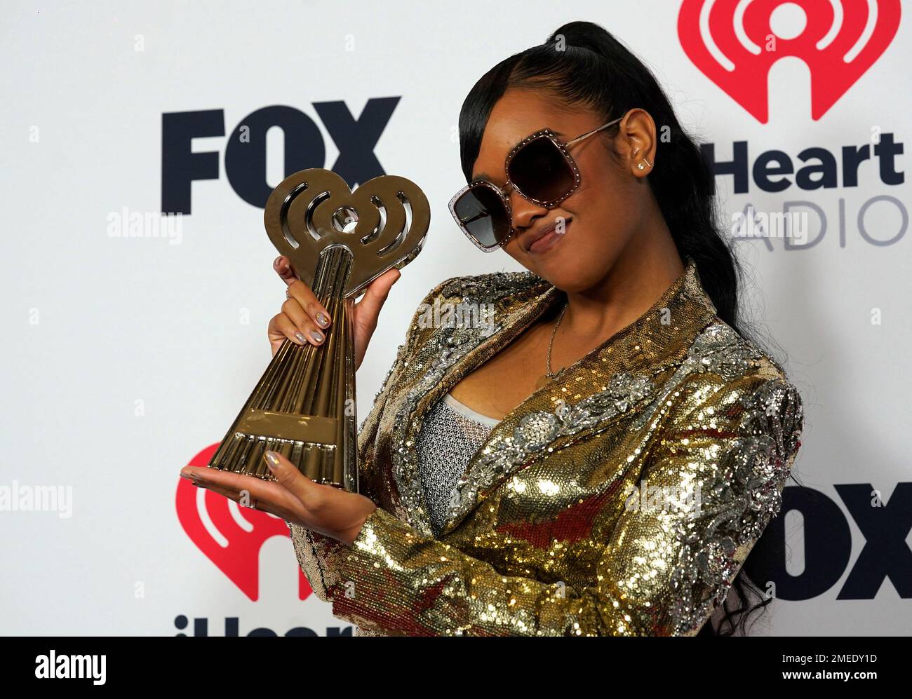 H.E.R., winner of the R&B artist of the year award, attends the ...