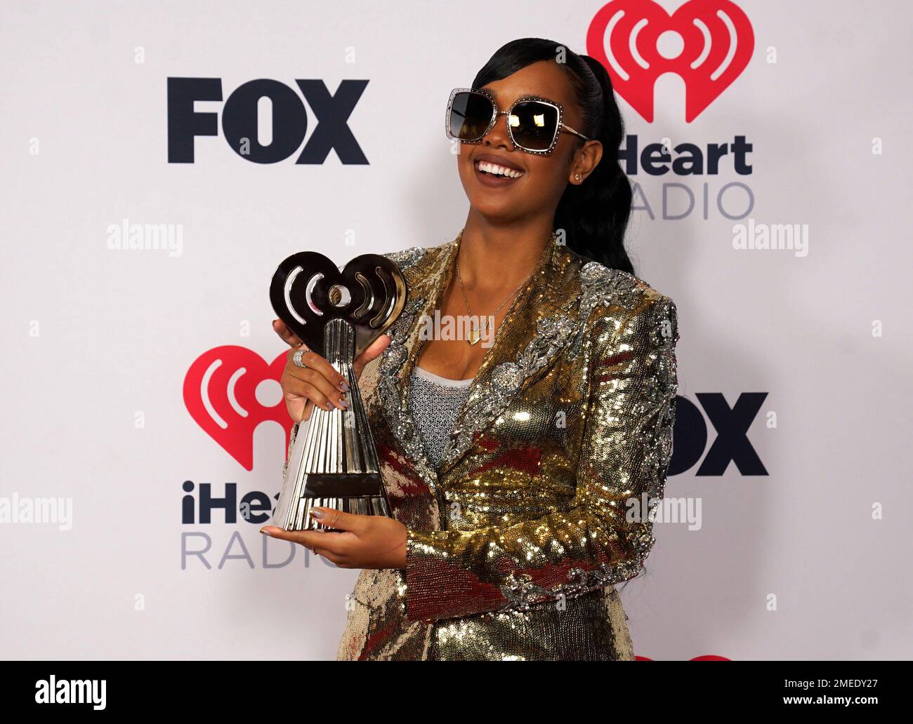 H.E.R., winner of the R&B artist of the year award, attends the ...
