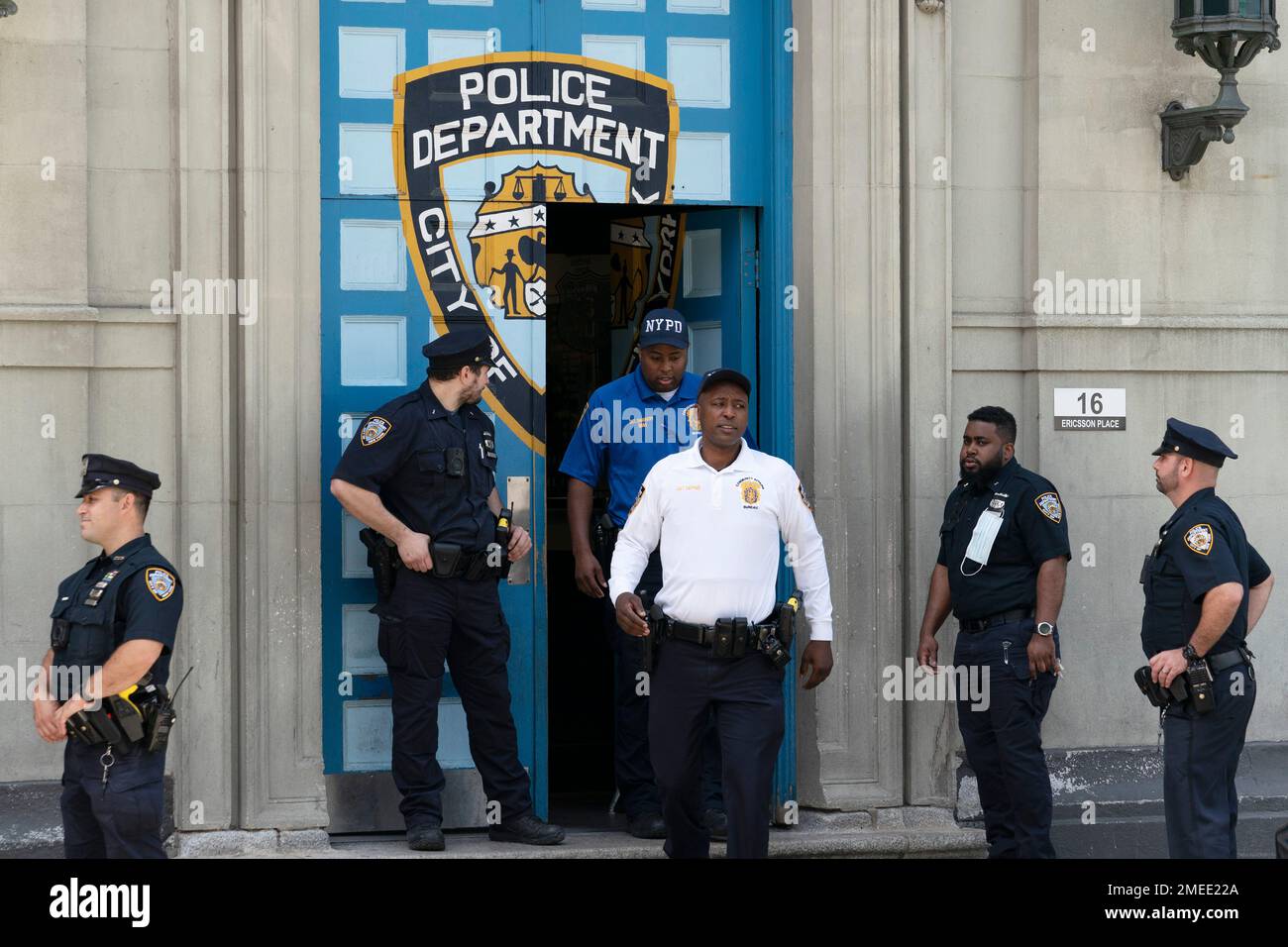 NYPD officers gather on the steps of the 1st Precinct, Tuesday, May 25 ...