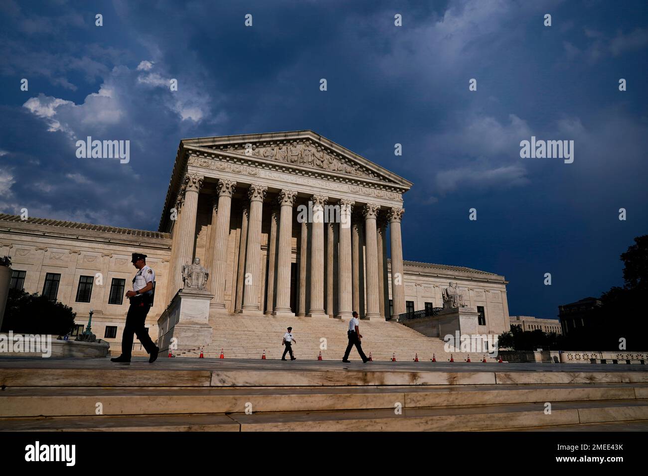 The Supreme Court is seen under threatening skies following a storm in ...