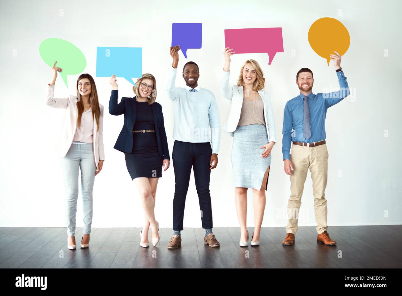 We are loud and proud. a group of work colleagues standing next to each ...
