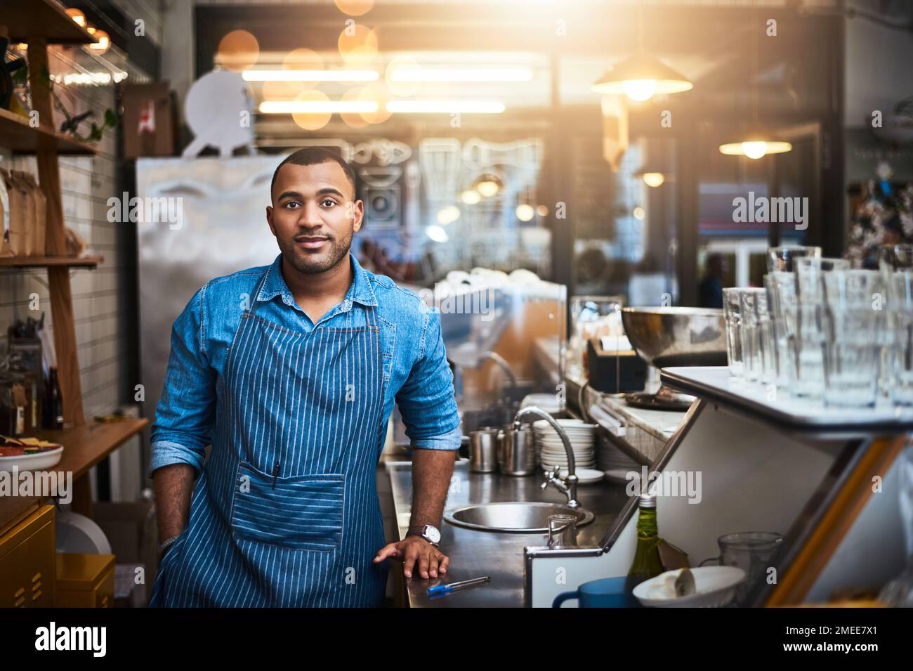 The best barista in town. Cropped portrait of a handsome young man ...