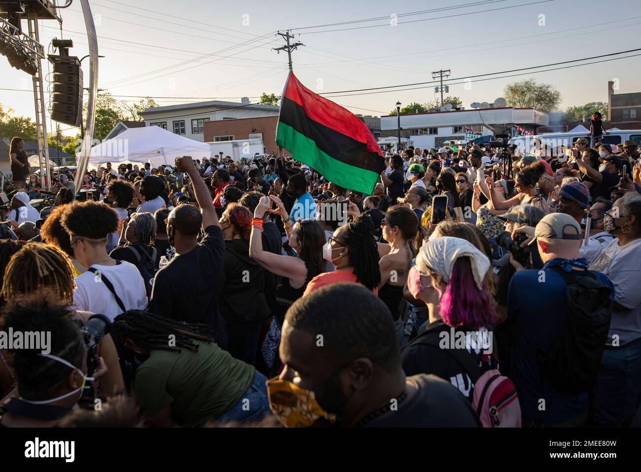 People gather for a concert at George Floyd Square on the one-year ...