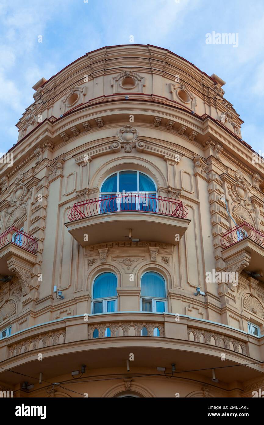 Picturesque corner building with carved stucco pattern Stock Photo - Alamy