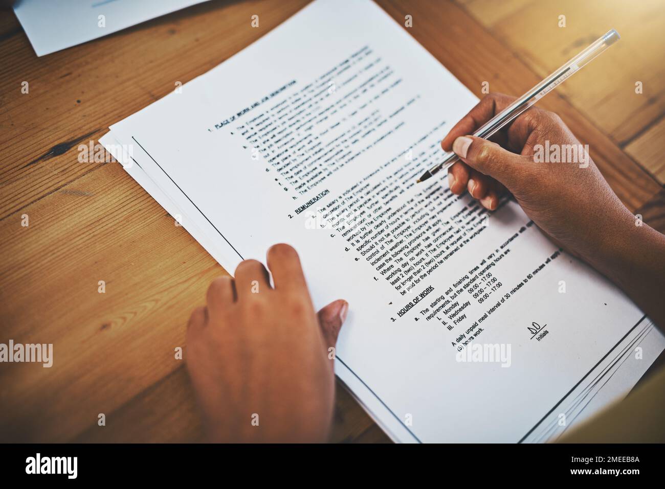 No speed reading for her. a businesswoman completing paperwork at a ...