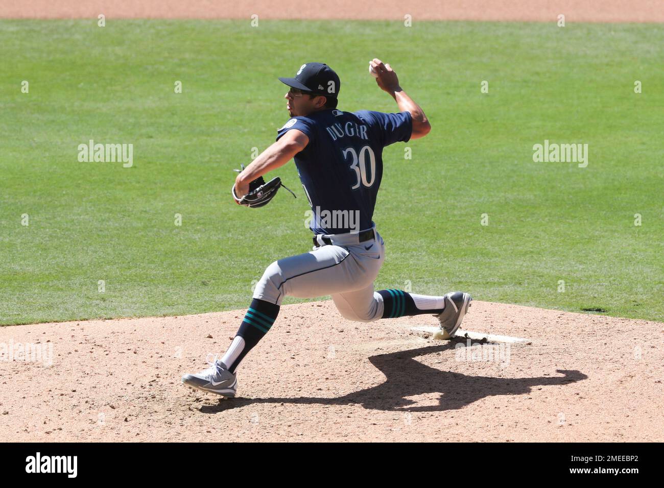 Seattle Mariners Robert Dugger throws a pitch against the San Diego ...
