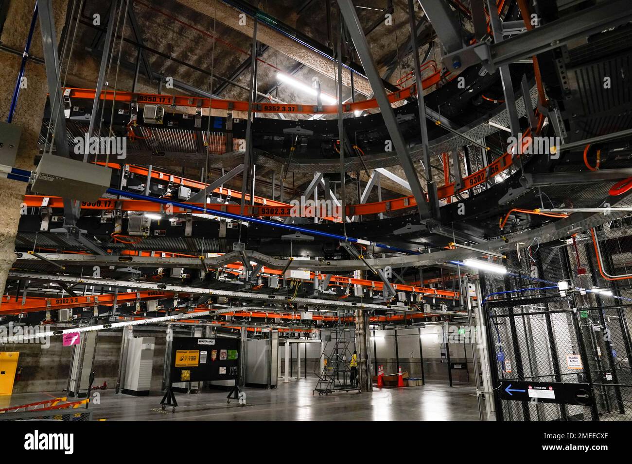 An automated storage and retrieval baggage handling system uses plastic ...