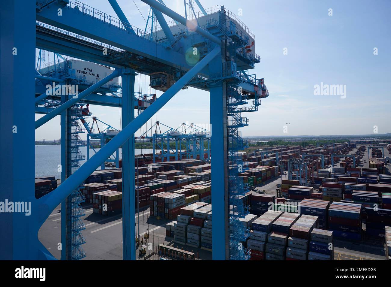 Shipping containers are stacked in the Port of New York and New Jersey ...