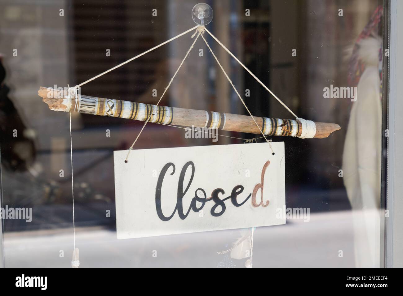 closed boutique text sign board door entrance on windows shop door ...