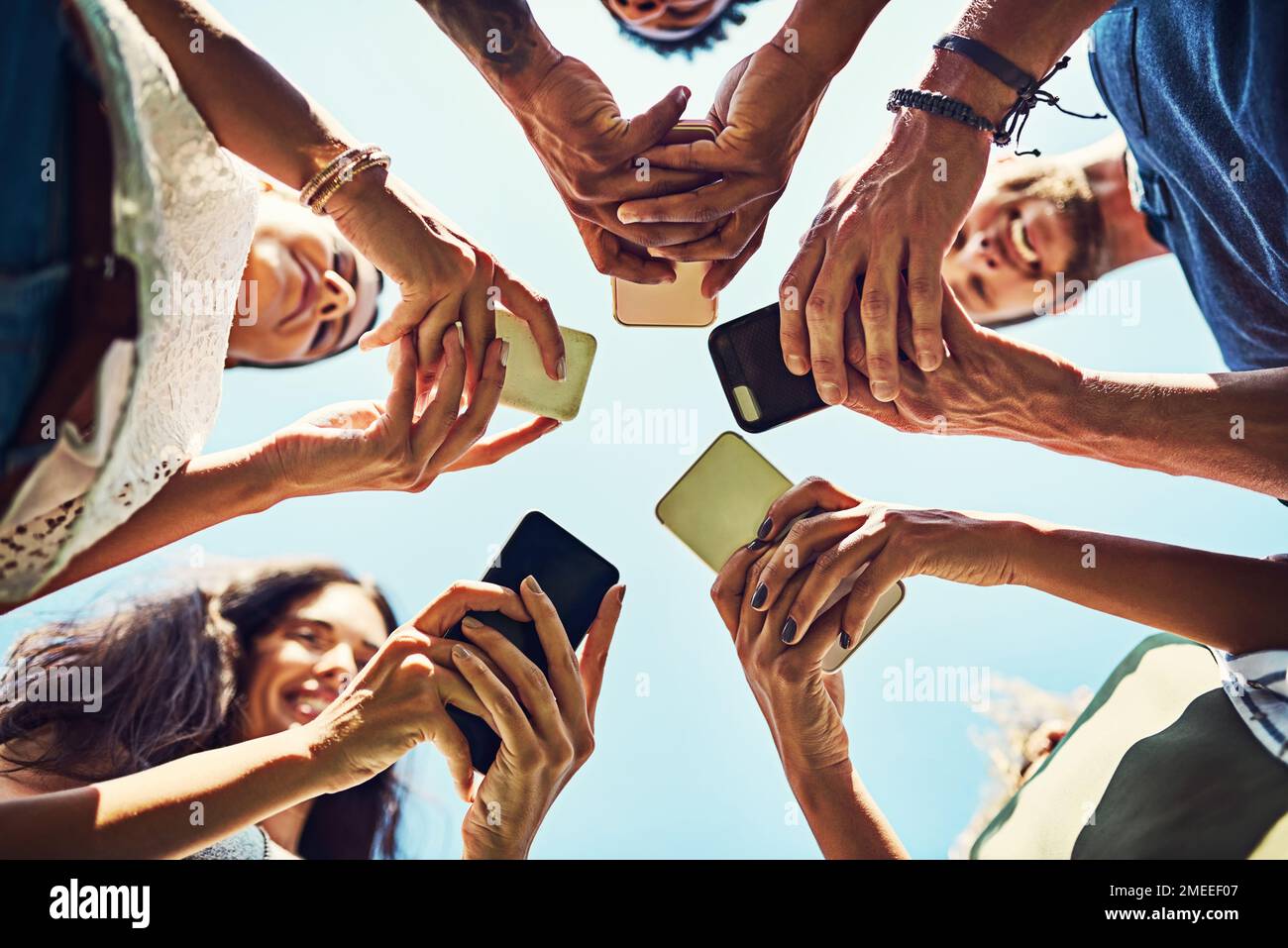 Whats happening in your social circle. a group of people using their ...