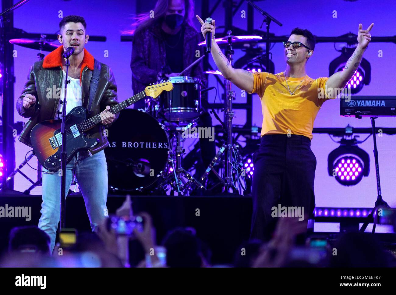 Nick Jonas, from left, and Joe Jonas, of the Jonas Brothers, perform at ...