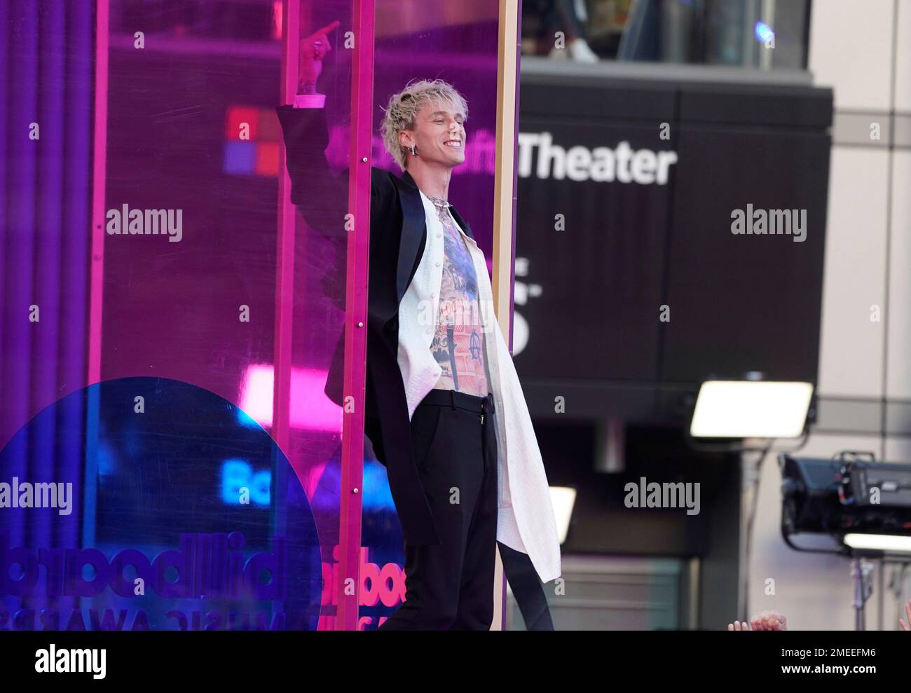 Machine Gun Kelly acknowledges the crowd after accepting the top rock ...